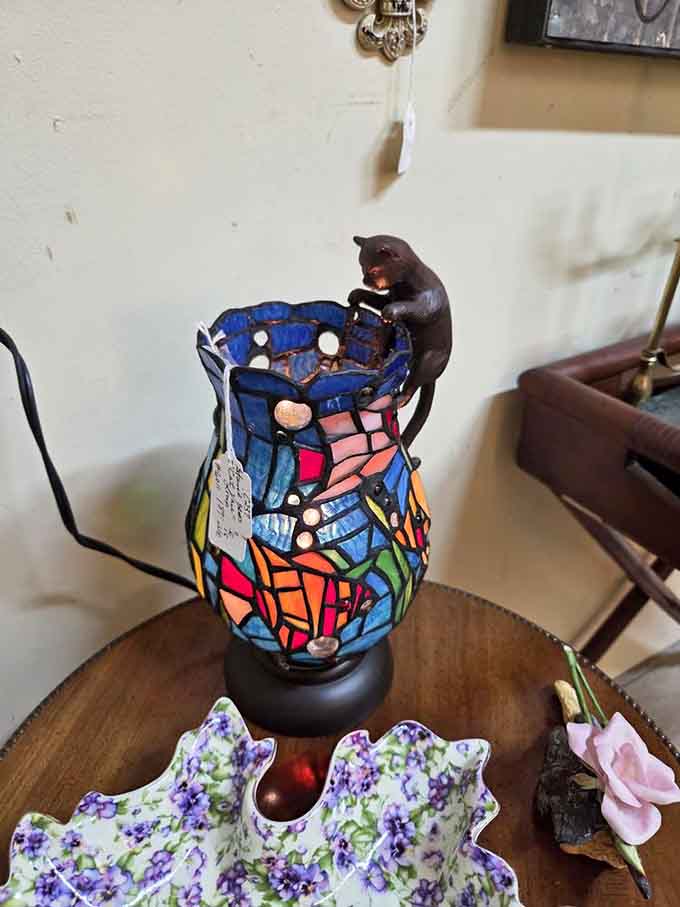 Stained glass lamps casting colorful light like tiny rainbows decided to set up permanent residence indoors.