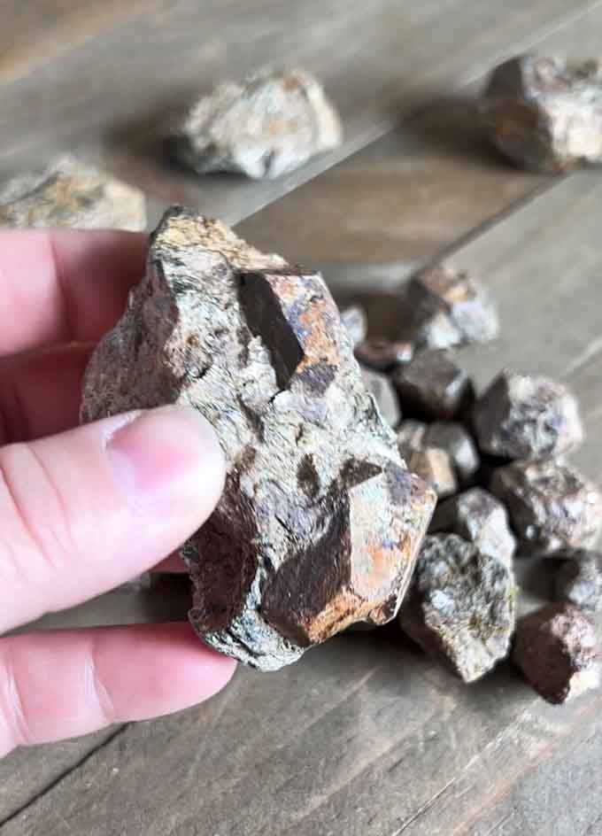 A garnet specimen fresh from the mine proves that patience and persistence pay off in semi-precious dividends.