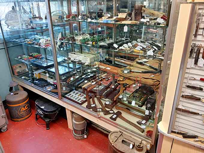 Glass cases protect vintage tools and collectibles, each piece representing craftsmanship from eras when things were built to last.