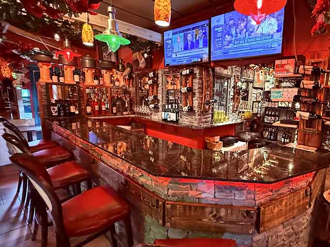 The bar area gleams with promise, ready to pour you something perfect to accompany your upcoming pasta feast tonight.