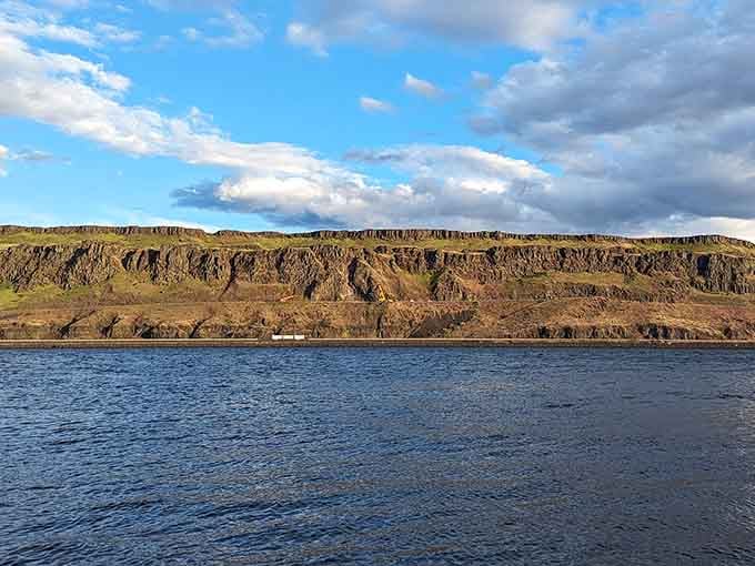 Basalt cliffs rising dramatically across the river, reminding you that geology can be genuinely impressive when it tries.