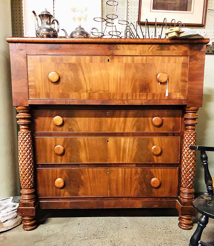 Hand-carved wooden drawers with details so intricate they put IKEA instructions to shame every single time.