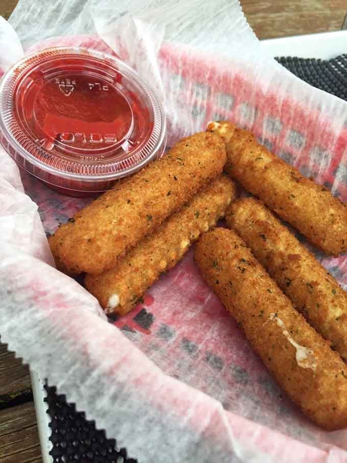 Mozzarella sticks with marinara sauce: the appetizer that never goes out of style, no matter what decade we're in.
