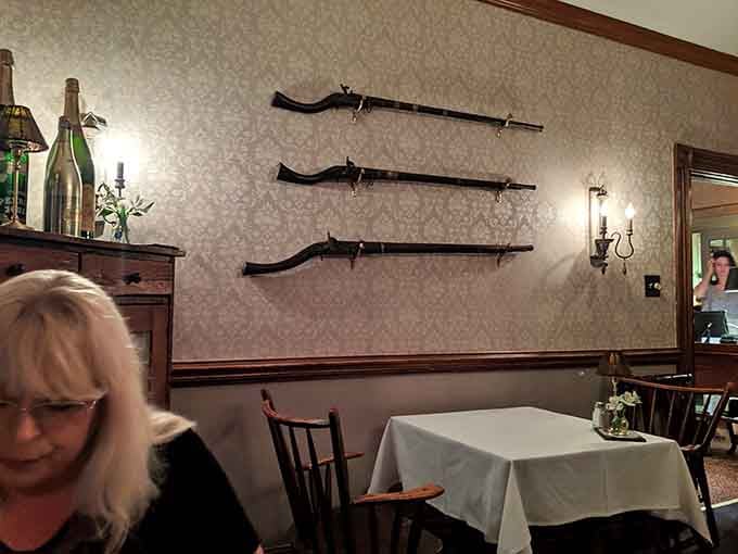 Those antique muskets on the wall add Kentucky character without turning the place into a theme park or history museum.