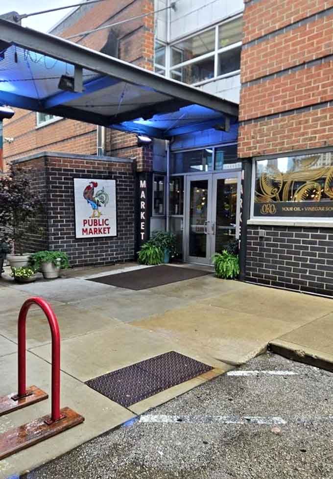 The welcoming entrance with its cheerful rooster logo invites you inside where culinary adventures await around every corner.