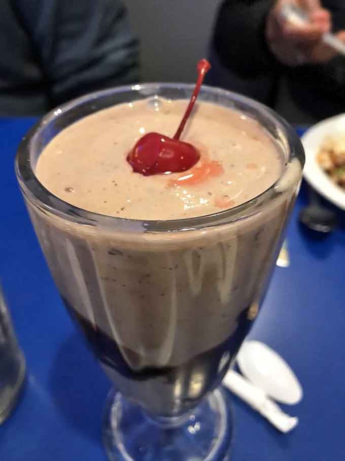 A milkshake topped with a cherry is the kind of retro treat that never goes out of style.
