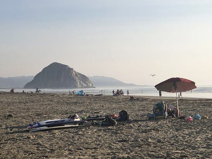 That volcanic sentinel watches over beachgoers like a patient lifeguard who's been on duty for 23 million years.