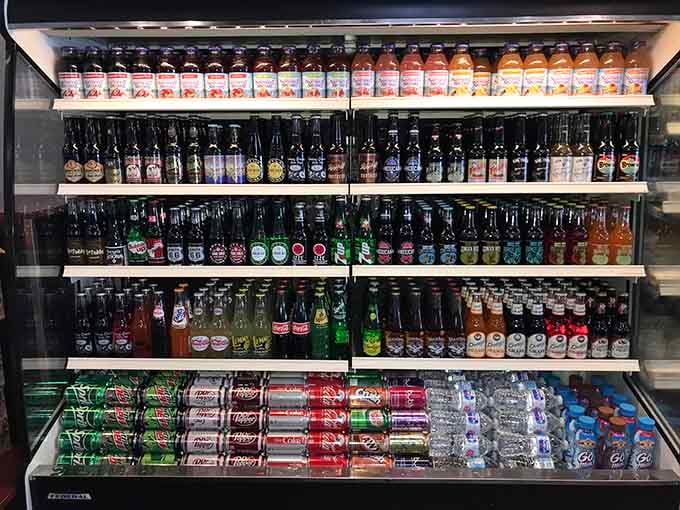 The beverage cooler stocks everything from craft sodas to familiar favorites, completing your perfect meal equation flawlessly.