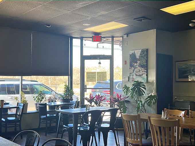 Natural light streaming through windows onto tables where good conversations happen over even better food and coffee.