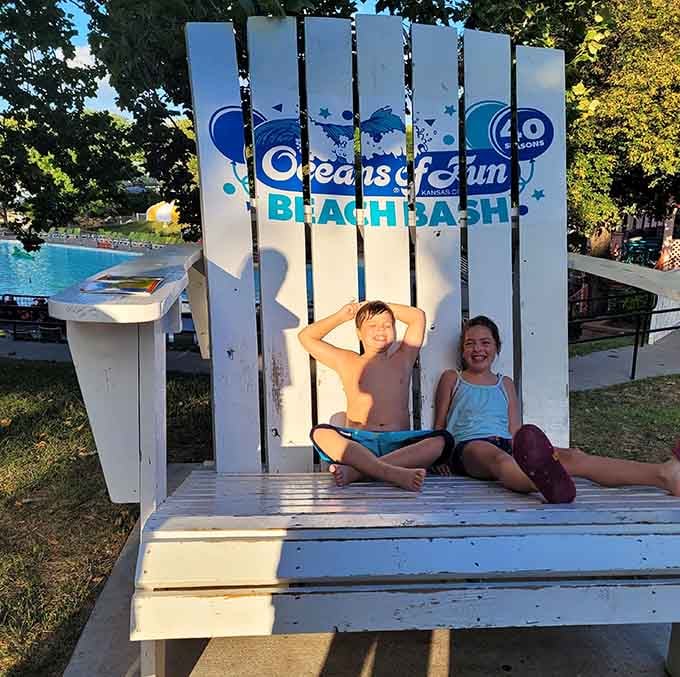 The oversized beach chair photo op that makes everyone look like they've shrunk in the Missouri sun.