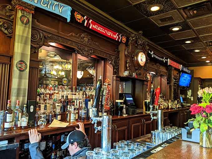 The bar stretches invitingly before you, stocked with enough Irish brews to make any beer lover weep joyfully.
