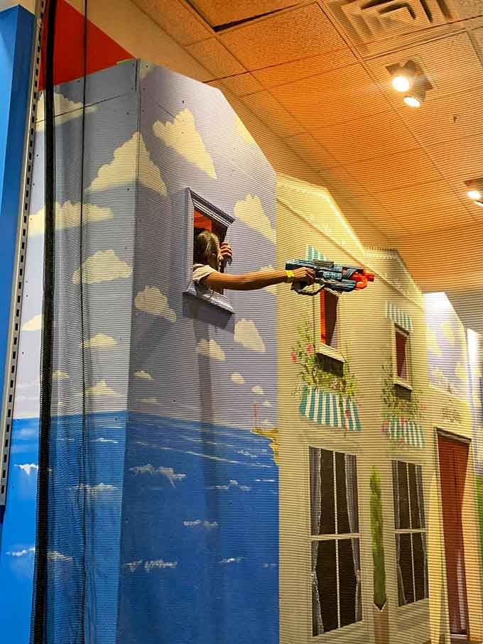 Scaling the climbing wall adds vertical strategy to the battlefield, because apparently ground-level combat wasn't challenging enough for these overachievers.