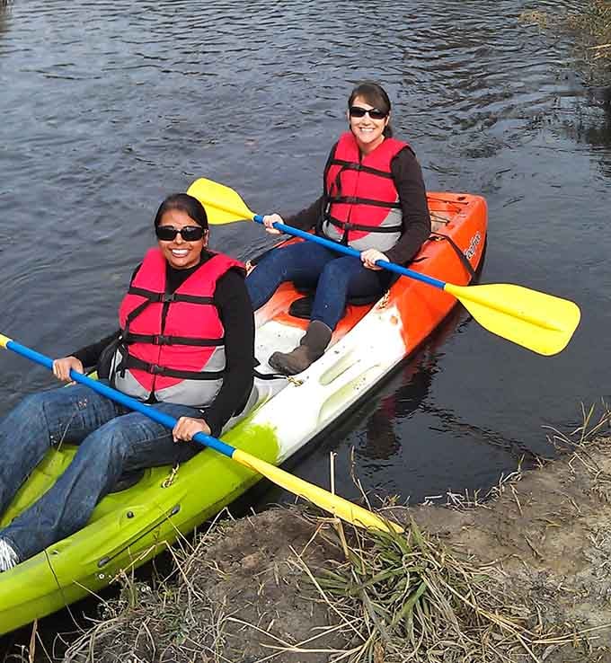 Double kayaking down the Saluda, where paddling in sync feels like a small victory worth celebrating together.