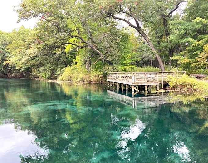 This crystal-clear spring water creates reflections so perfect, you'll question which way is up or down.