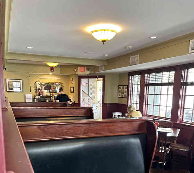 High-backed booths and traditional pub decor transport you straight to a proper British establishment, passport not required.