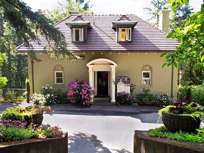 The charming Gate Lodge stands ready to welcome visitors into a world where elegance meets the unexplained.