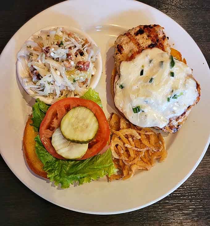 Melted cheese draped over grilled chicken creates the kind of sandwich that makes you forget about counting calories.
