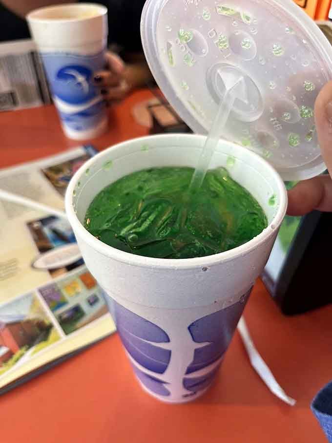 That bright green beverage looks like something from a science experiment, but in the best possible nostalgic way.