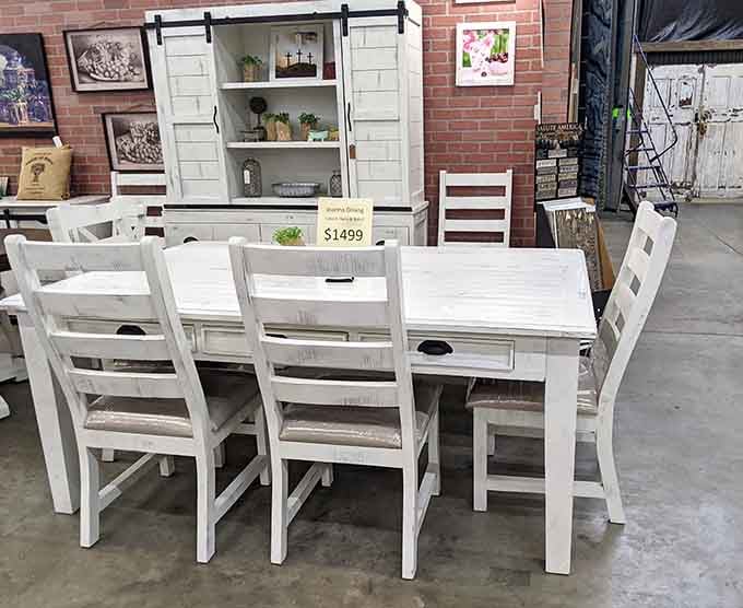 This farmhouse dining set is ready to host Sunday dinners that'll make your guests never want to leave your home.