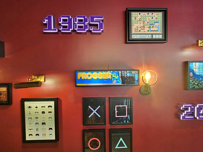 Retro gaming nostalgia decorates the walls, making millennials feel old and boomers feel oddly hip simultaneously.