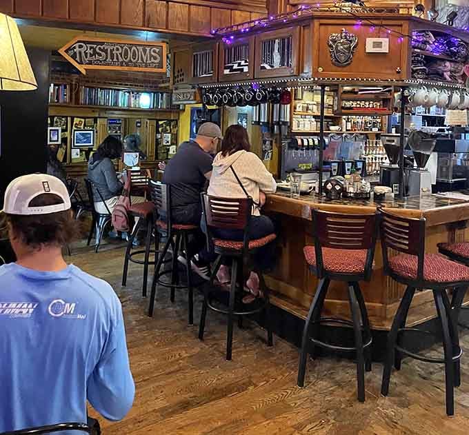 Counter seating with a view of the action and shelves of books—perfect for solo diners who enjoy people-watching with literature.