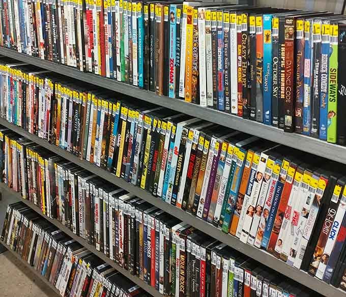 DVDs stack up like a video store time capsule, perfect for movie marathons without the streaming subscription fees.