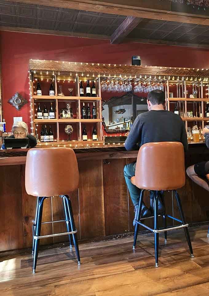 The bar where locals and travelers alike gather to contemplate life's important questions, like red or white tonight.