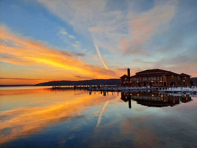 Sunsets this stunning should require a permit; the water doubles the spectacle with perfect reflections.
