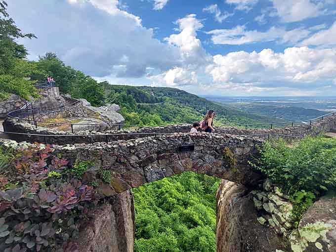 The sky bridge connects two worlds while your stomach does somersaults, reminding you that you're wonderfully alive.