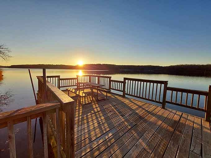 Golden hour transforms the fishing pier into something from a postcard, where time slows and worries drift away.