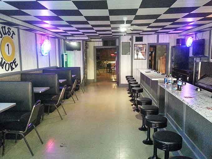 That retro diner vibe with checkered floors takes you back to when jukeboxes ruled the restaurant scene.