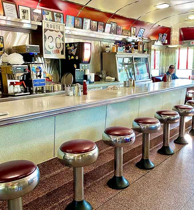 Chrome stools and a counter view where you can watch the magic happen right before your hungry eyes.