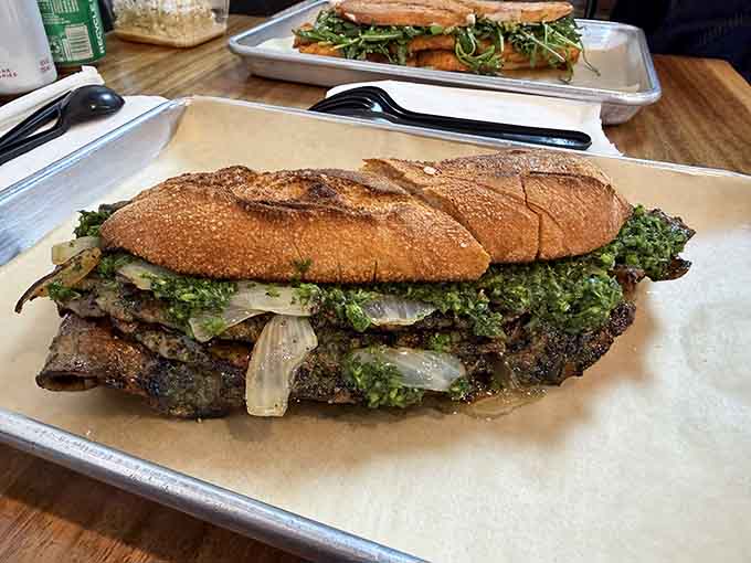 This steak sandwich comes loaded with enough chimichurri and caramelized onions to change your entire lunch perspective forever.