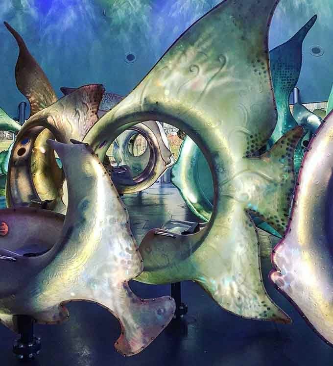 The metallic sheen on these sculptural fish catches light like fresh catch at Fulton Market, but infinitely more whimsical.