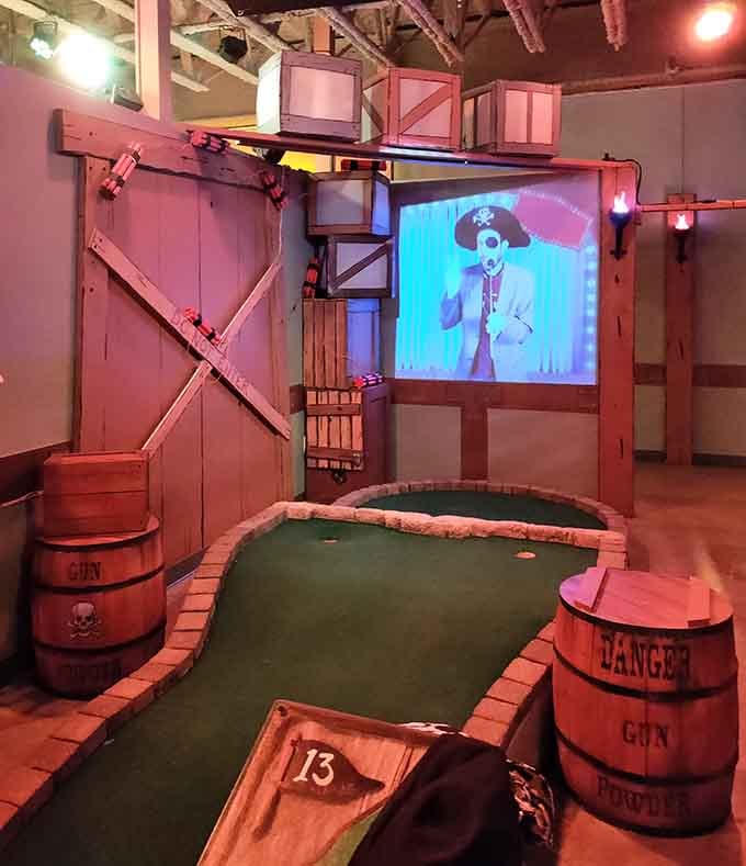 Wooden barrels labeled "Danger" and a projected pirate create theatrical flair that makes hole thirteen genuinely entertaining to play through.