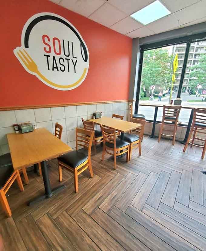 Clean, welcoming dining space with warm orange walls that make you feel right at home before the food arrives.