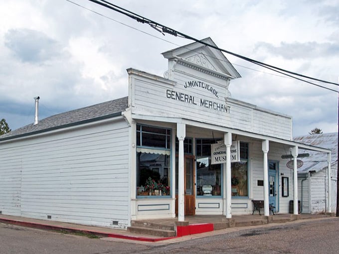 The Monteverde General Merchant building stands white and proud, looking exactly like your grandparents' favorite Western movie set.