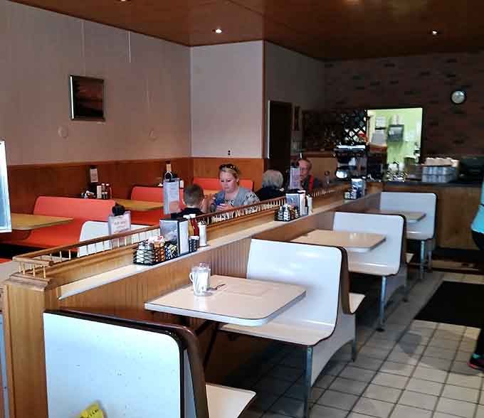 Classic booth seating invites lingering conversations over coffee, just like diners did in the good old days.