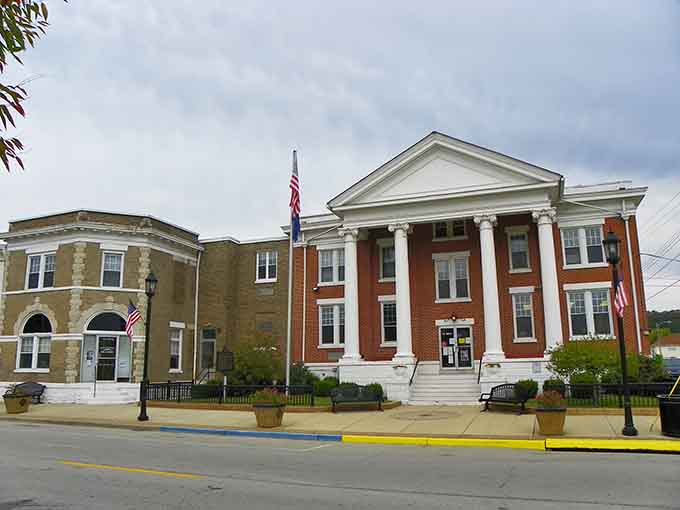Stately columns and red brick architecture command respect, anchoring downtown with dignified presence since the town's earliest days.