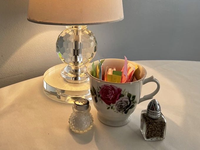 Even the condiments get their moment on vintage china, because every detail matters in this enchanted space.