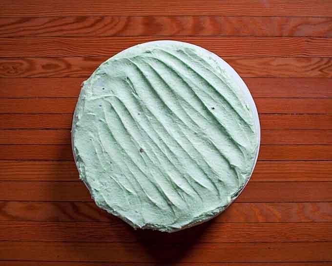 Pistachio cheesecake with that perfect swirl pattern: because sometimes dessert deserves as much attention as the main event itself.