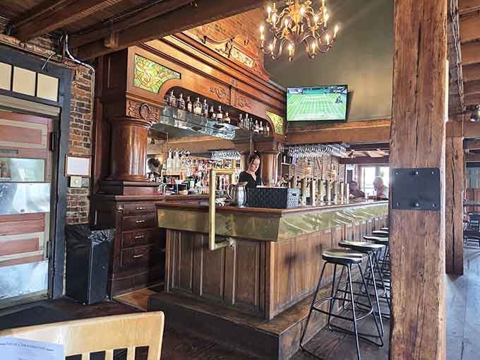 The bar area blends rustic charm with modern comfort, where good drinks and better conversations happen naturally every night.