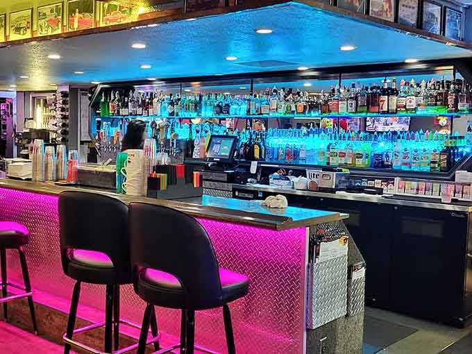 That bar backlighting is giving off serious nightclub-meets-neighborhood-hangout vibes, and we're absolutely here for it all.