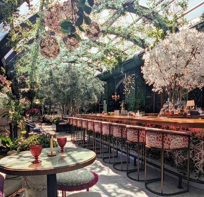 The bar area glows like a scene from a romantic movie, complete with chandeliers and enough ambiance for days.