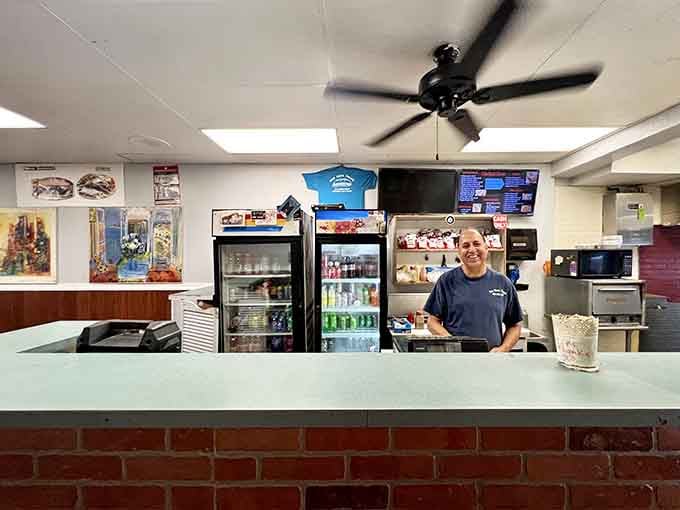 The friendly face behind the counter where all the magic begins, ready to take your order.