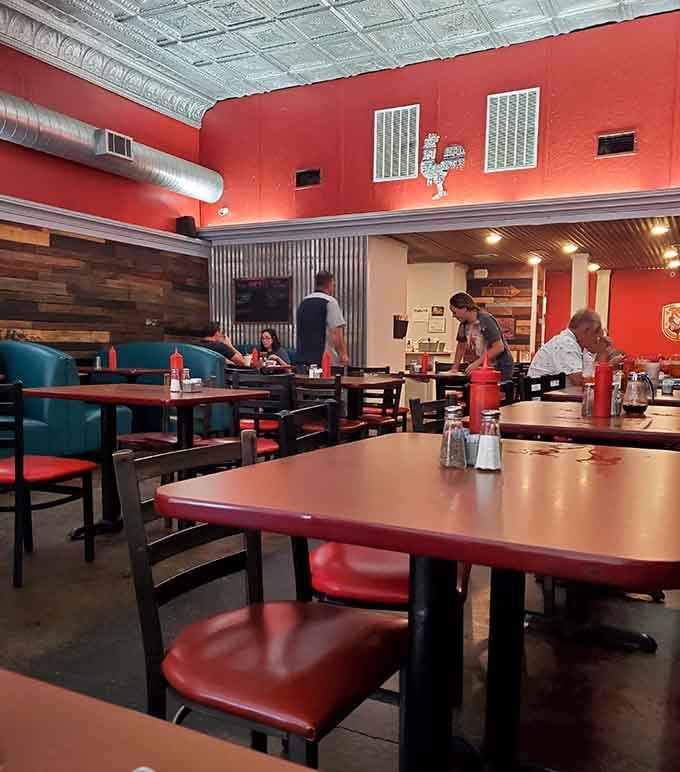 The vintage tin ceiling and warm wood paneling give this space more character than most sitcom sets from the '70s.