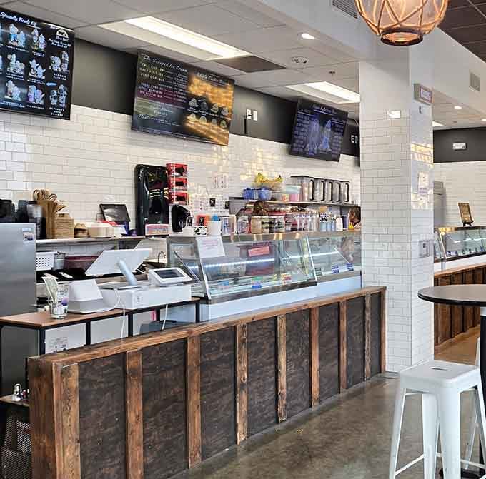 A spotless counter, gleaming display case, and multiple menu screens signal that The Yard takes its craft seriously.