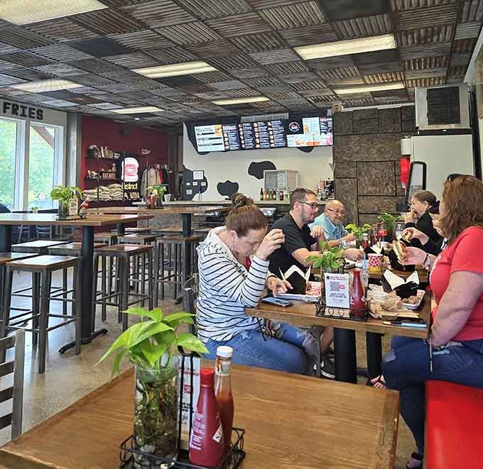 Real people enjoying real food in a real restaurant, capturing that authentic community vibe that makes local spots special.