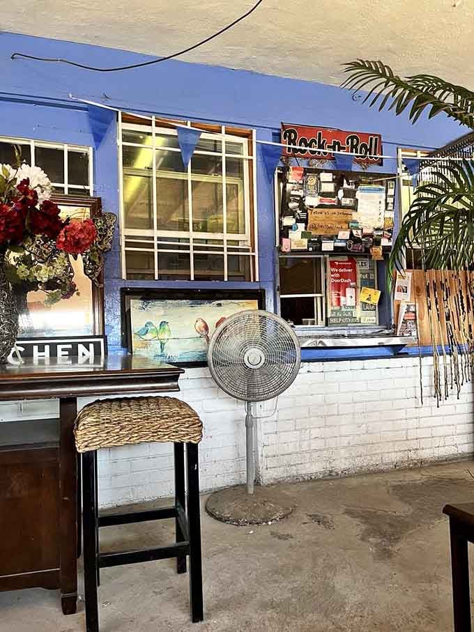 The order window at this vibrant blue spot promises rock and roll vibes with your soul food.