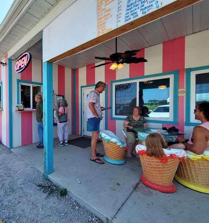 The outdoor seating features giant ice cream cone chairs, because regular furniture is apparently too boring here.